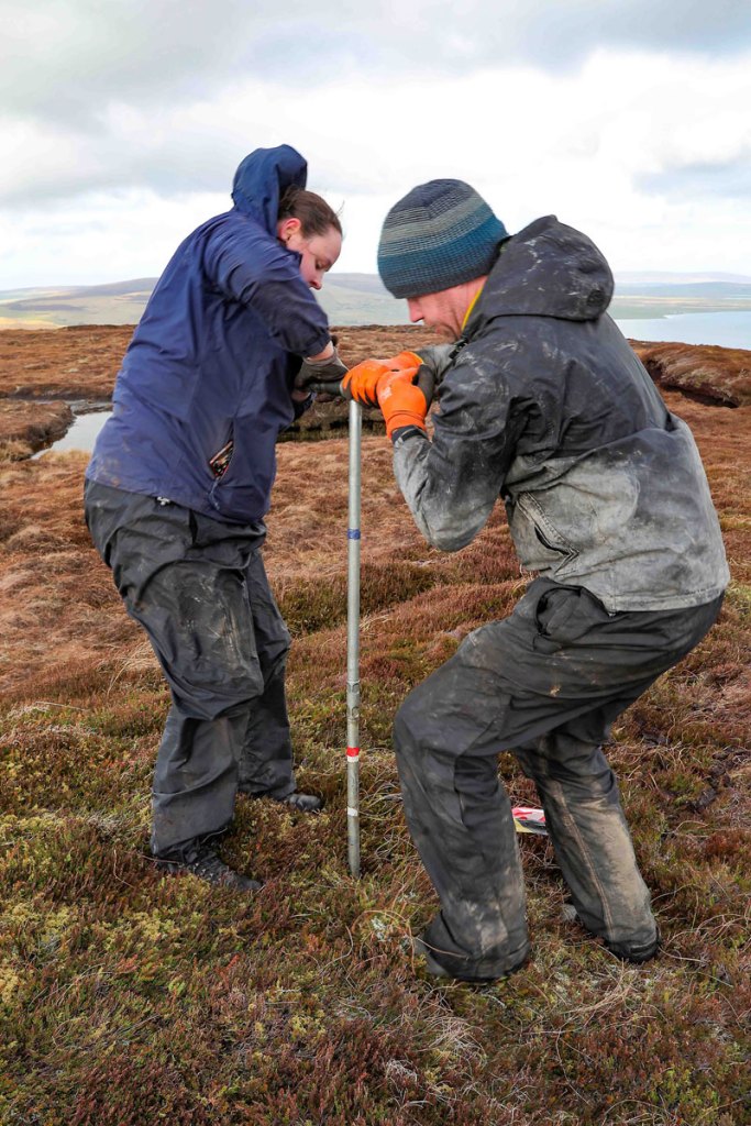Blue skies and a brisk breeze for students' hilltop augering session ...